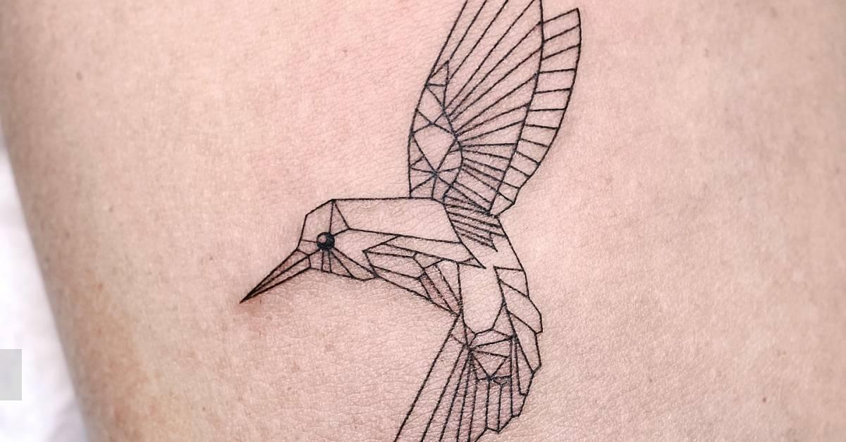 Low poly hummingbird tattoo located on the inner