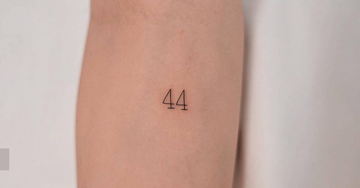 Tattoo of the number "44" located on the inner forearm.