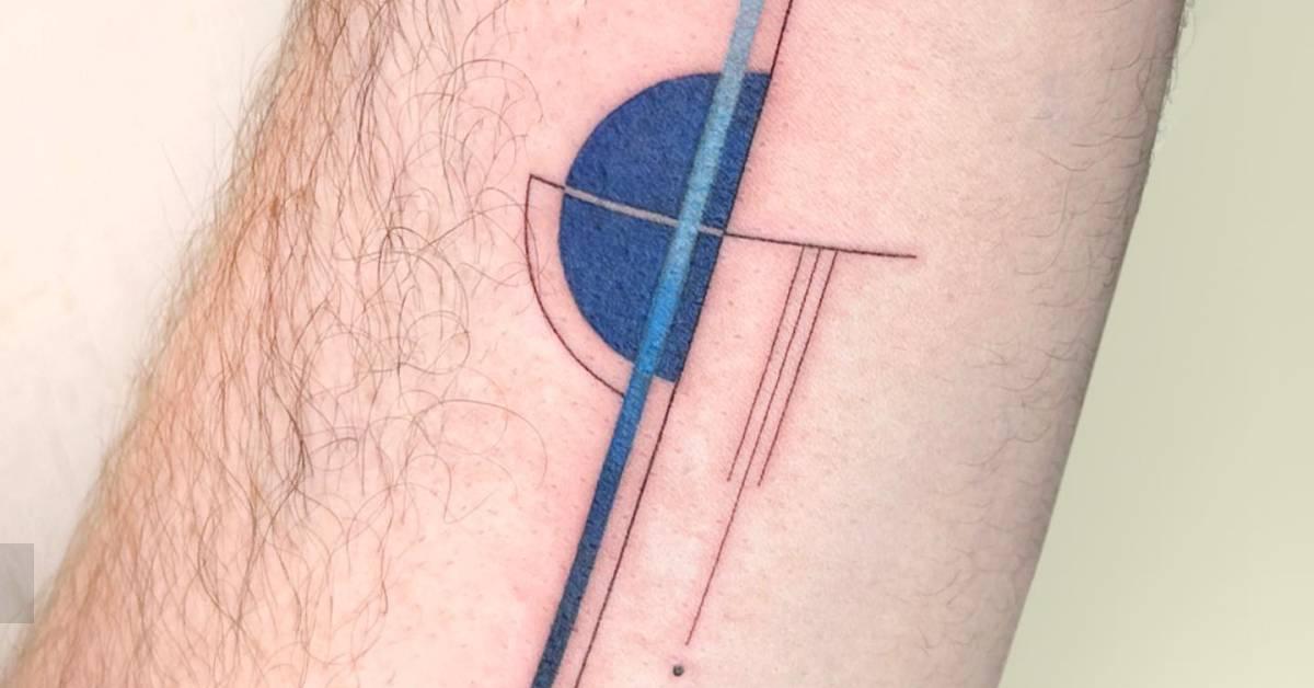 Abstract geometric tattoo done on the inner forearm.