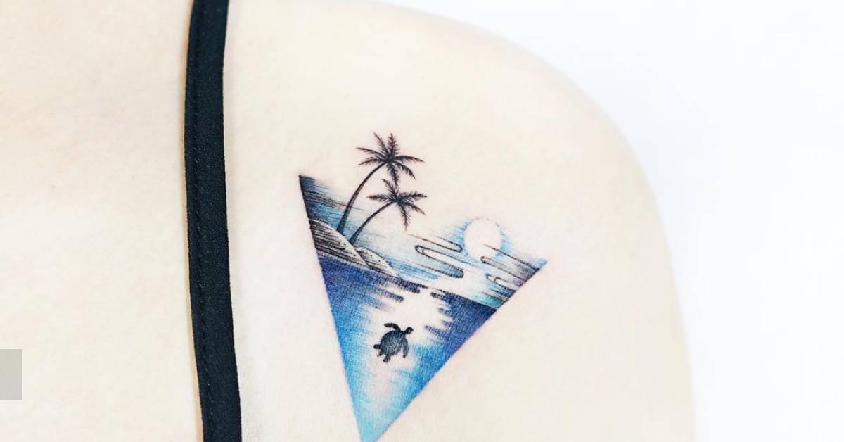 Beach triangle tattoo in watercolor style located on