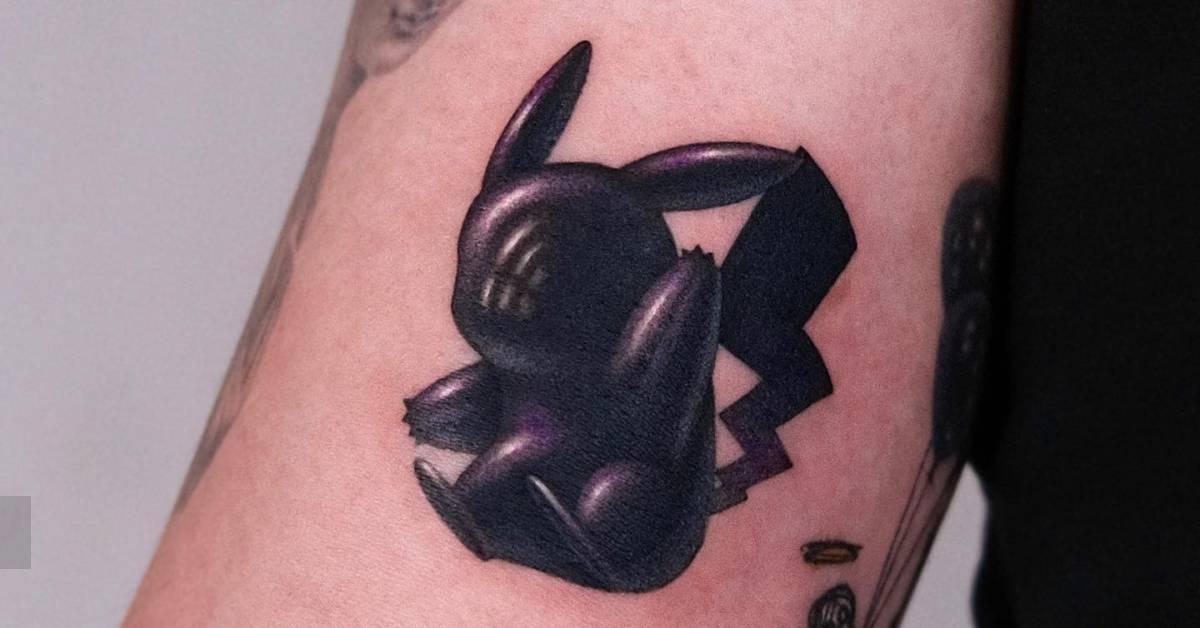 Pop art style Pikachu tattoo located on the bicep.