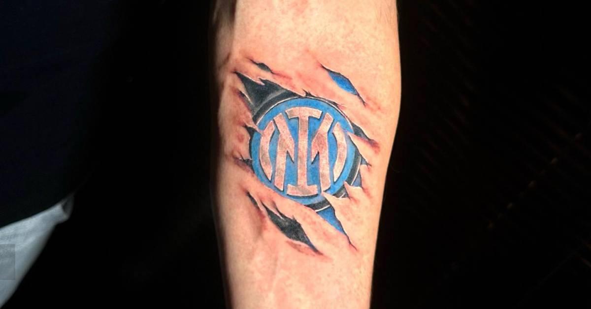 Inter Milan tattoo located on the inner forearm.
