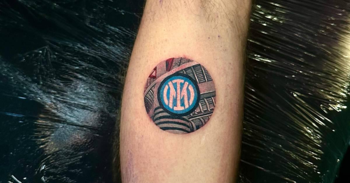 Micro-realistic style Inter Milan tattoo located on the
