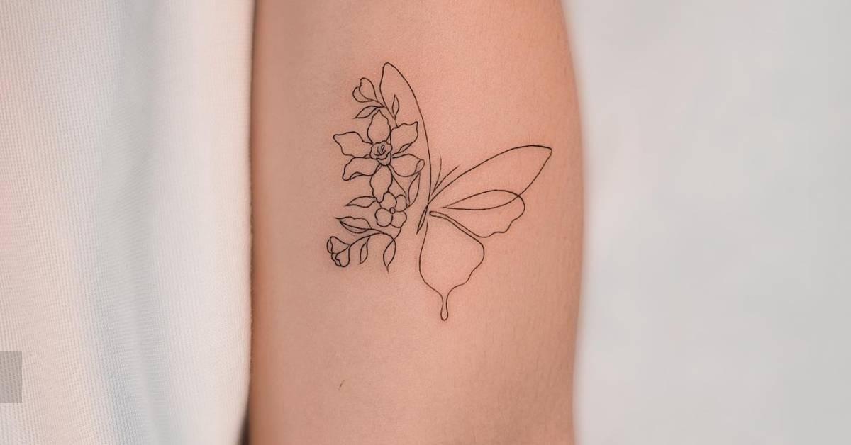 One line butterfly flower tattoo located on the inner