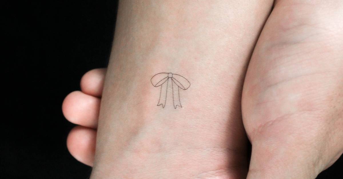 Small fine line ribbon bow temporary tattoo
