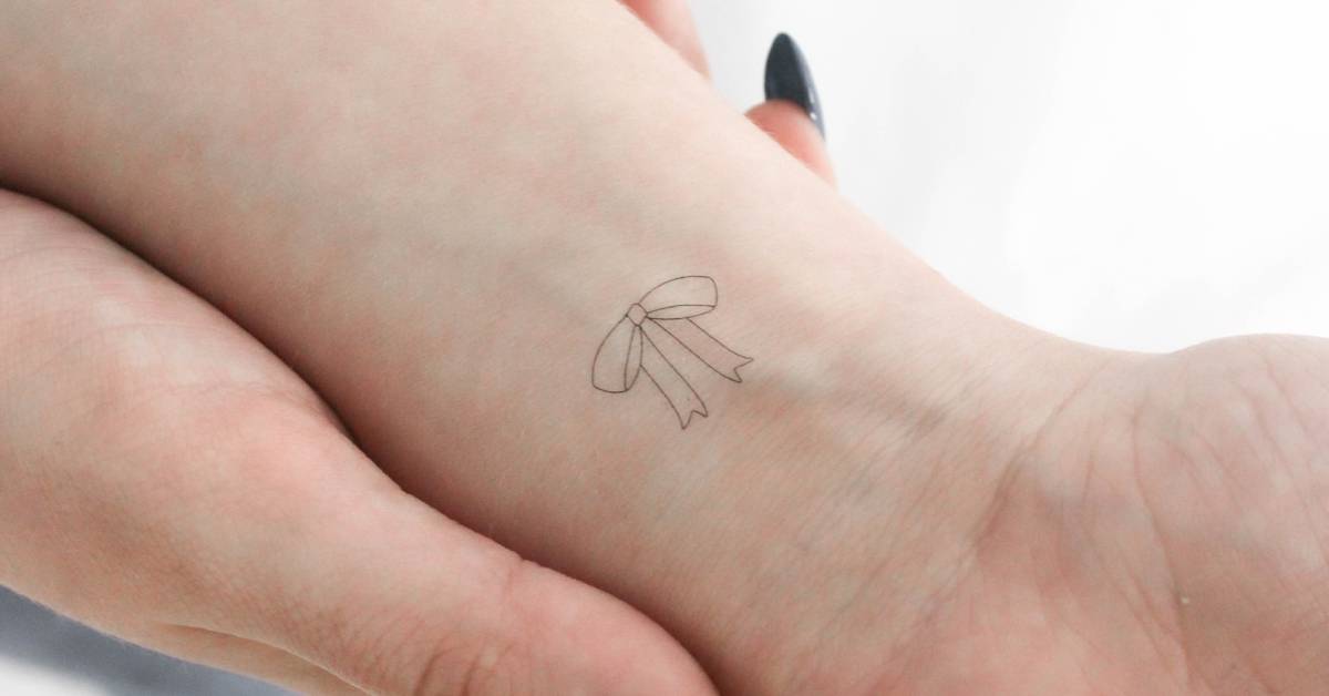 Small fine line ribbon bow temporary tattoo