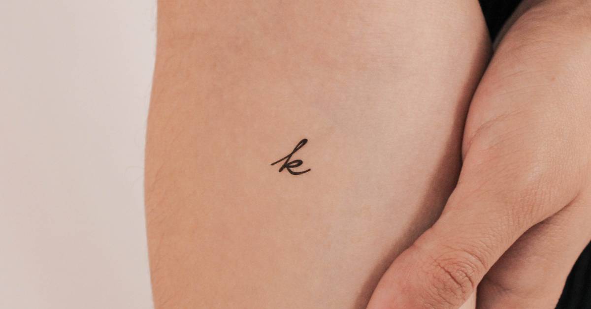 Handwritten K letter temporary tattoo