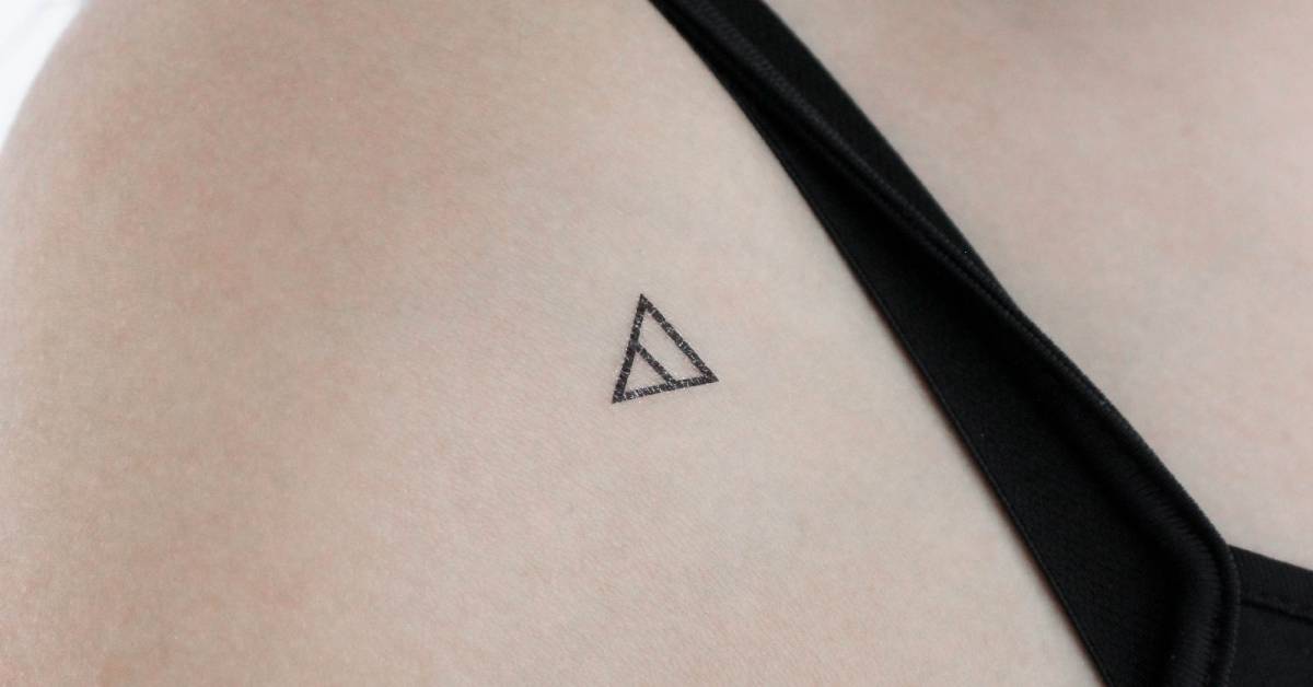 Minimalistic style transform symbol temporary tattoo