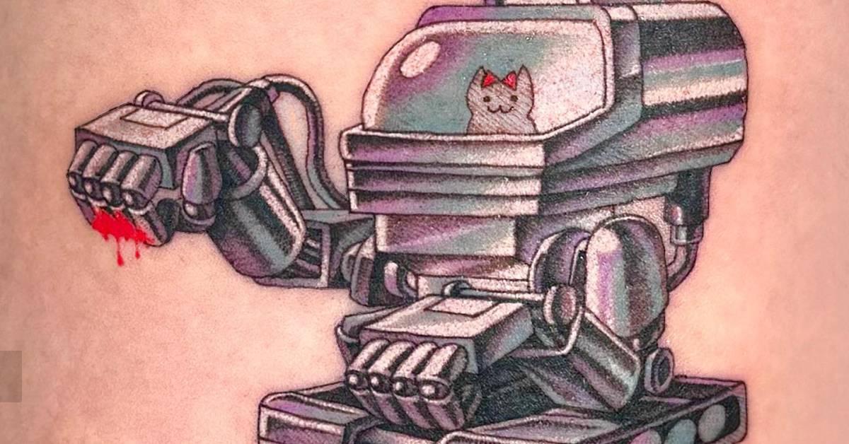 Robot and cat tattoo located on the thigh, cartoon