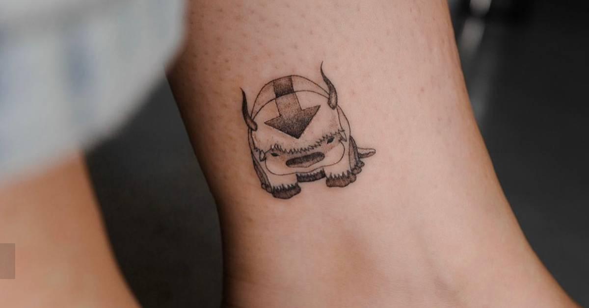 Cartoon style Appa tattoo located on the ankle.
