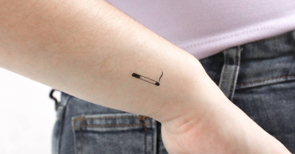 Minimalistic style cigarette temporary tattoo placed on