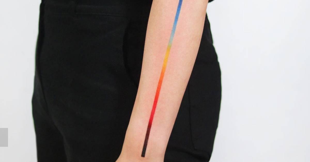 Spectrum line tattoo located on the forearm.