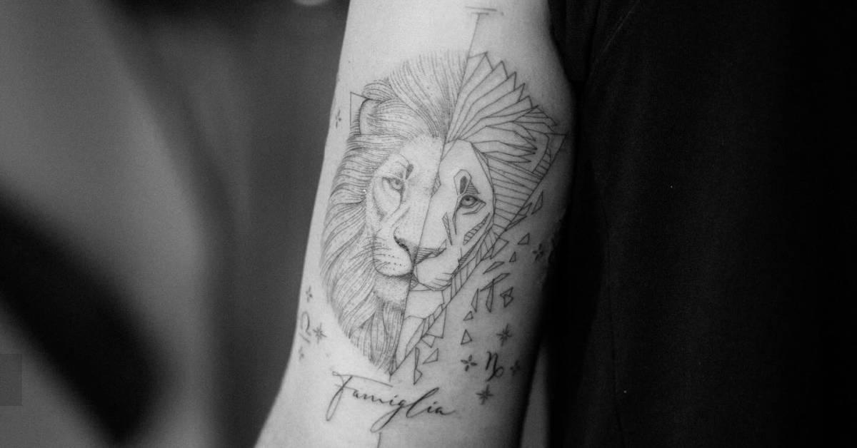 Fine line style lion portrait tattoo placed on the