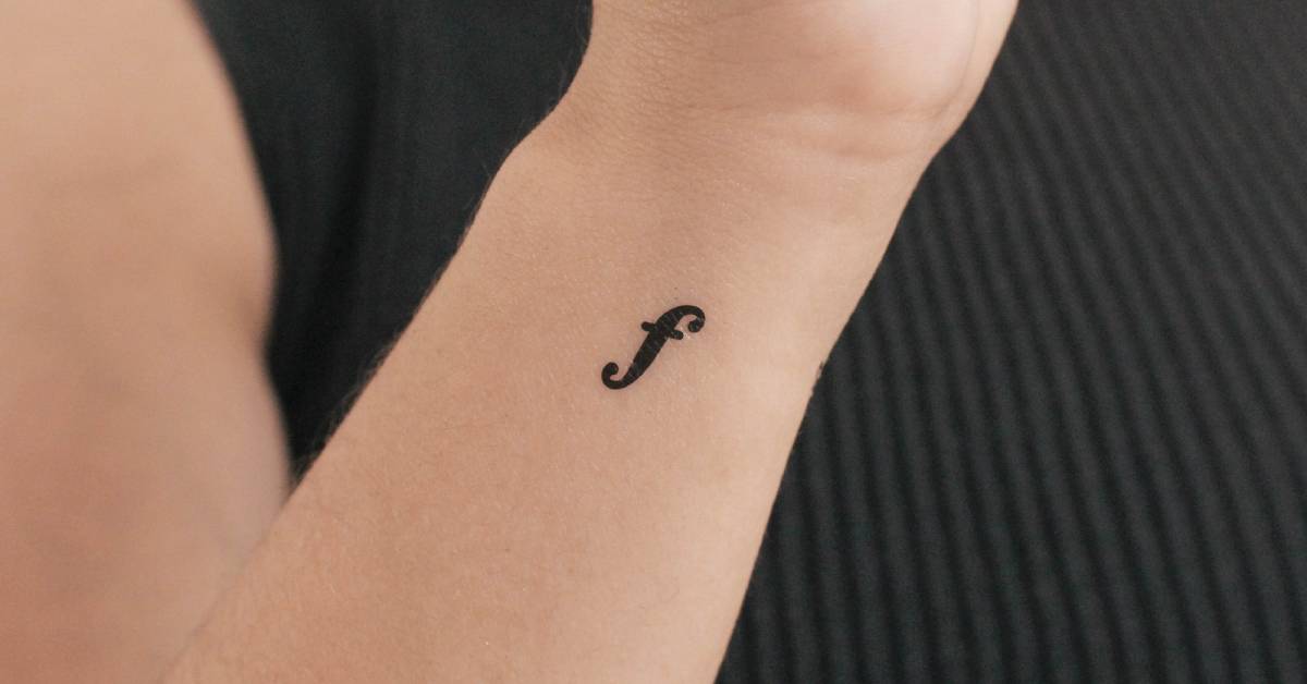 Forte musical symbol temporary tattoo located on the
