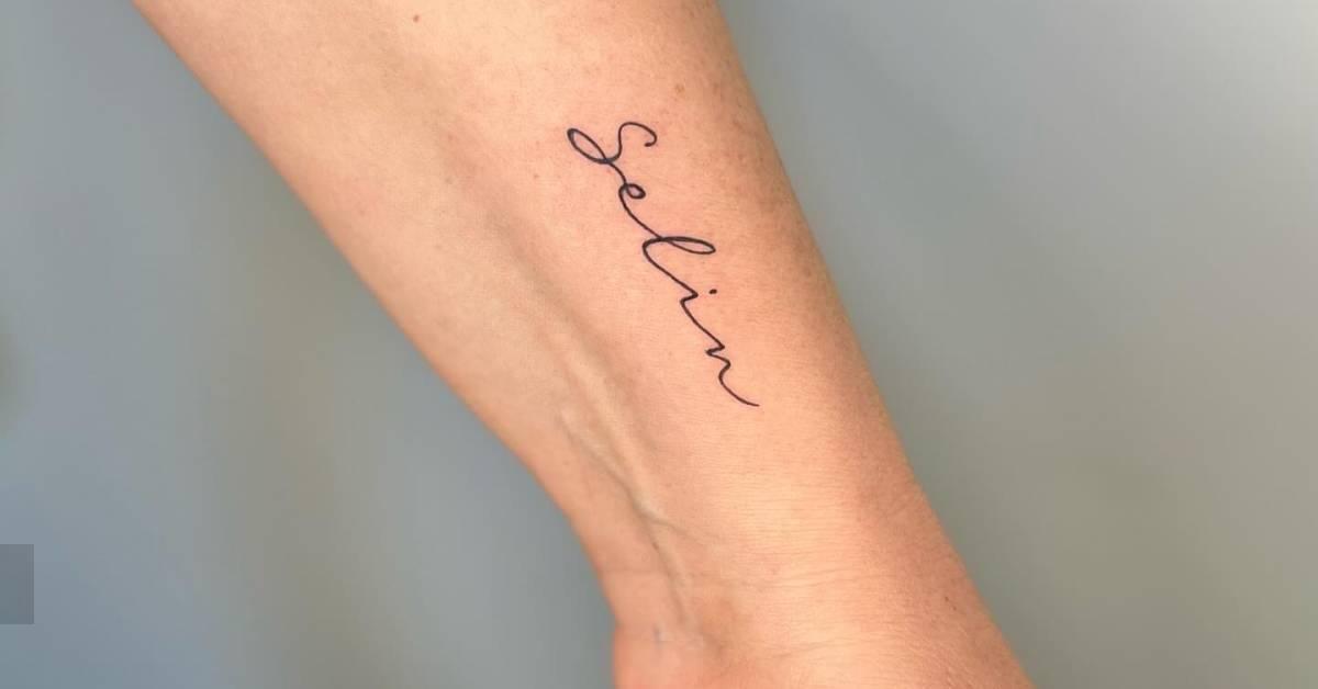 Lettering tattoo of the name "Selin" located on the