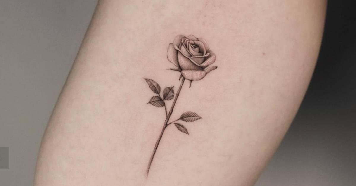 Micro-realistic style rose tattoo located on the inner