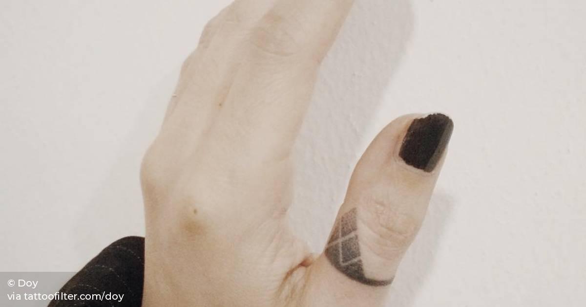 Geometric style ring tattoo.