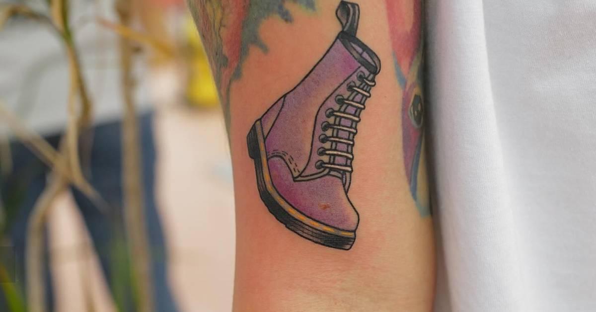 Traditional style Dr. Martens boot tattoo located on