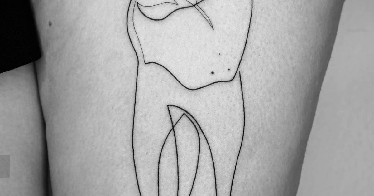 Continuous line tooth tattoo located on the thigh.