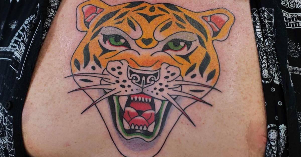 Traditional style tiger head tattoo located on the