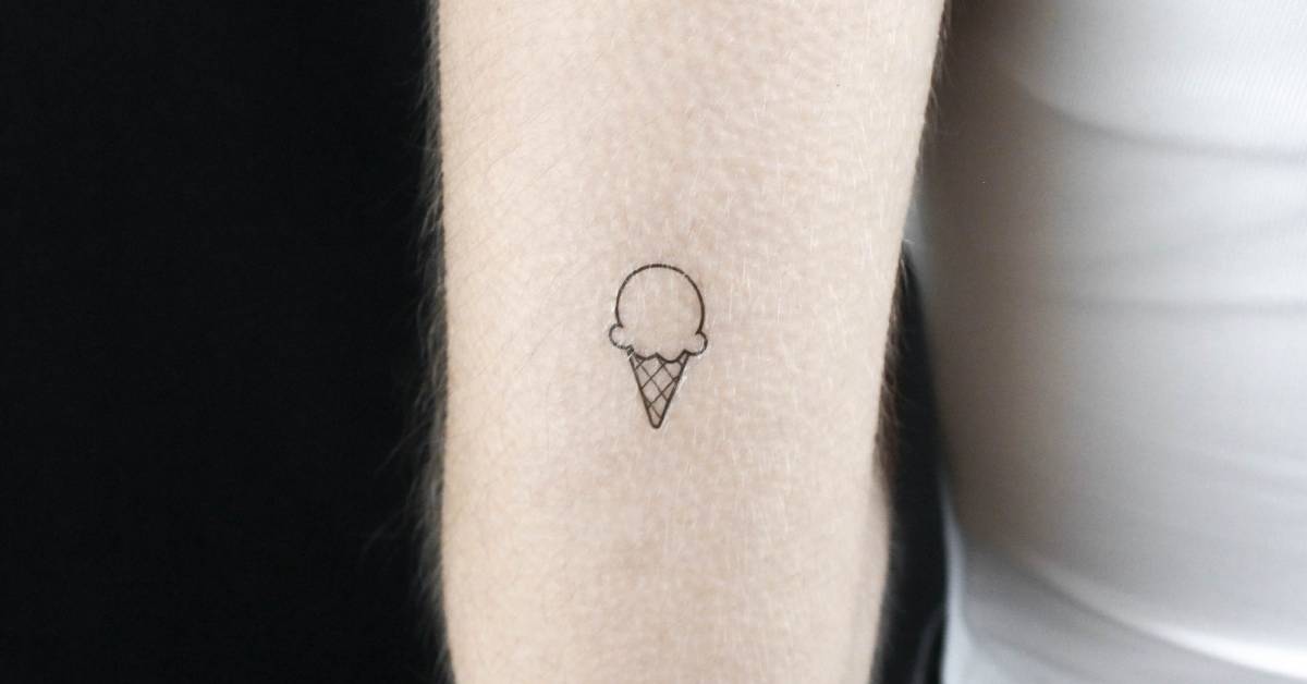 Fine line style ice cream cone temporary tattoo located