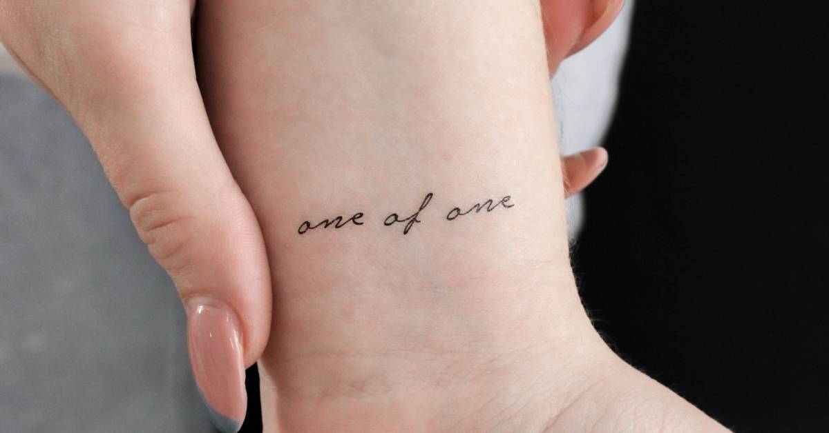 Handwritten font 'one of one' temporary tattoo