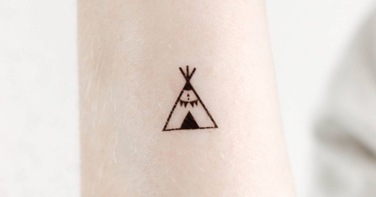 Tiny minimalistic tipi temporary tattoo located on the