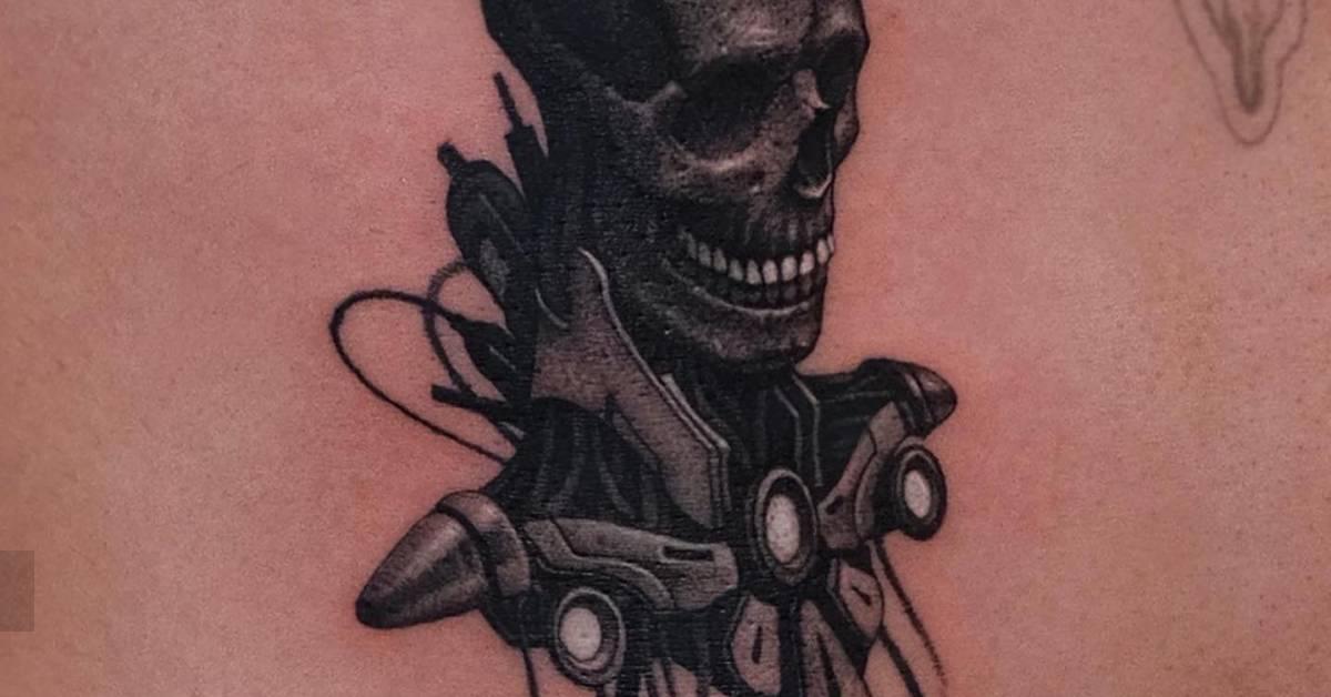 Humanoid robot tattoo in comic style located on the