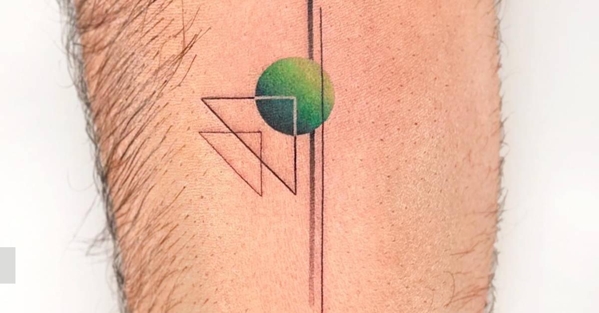 Abstract geometric tattoo located on the inner forearm.