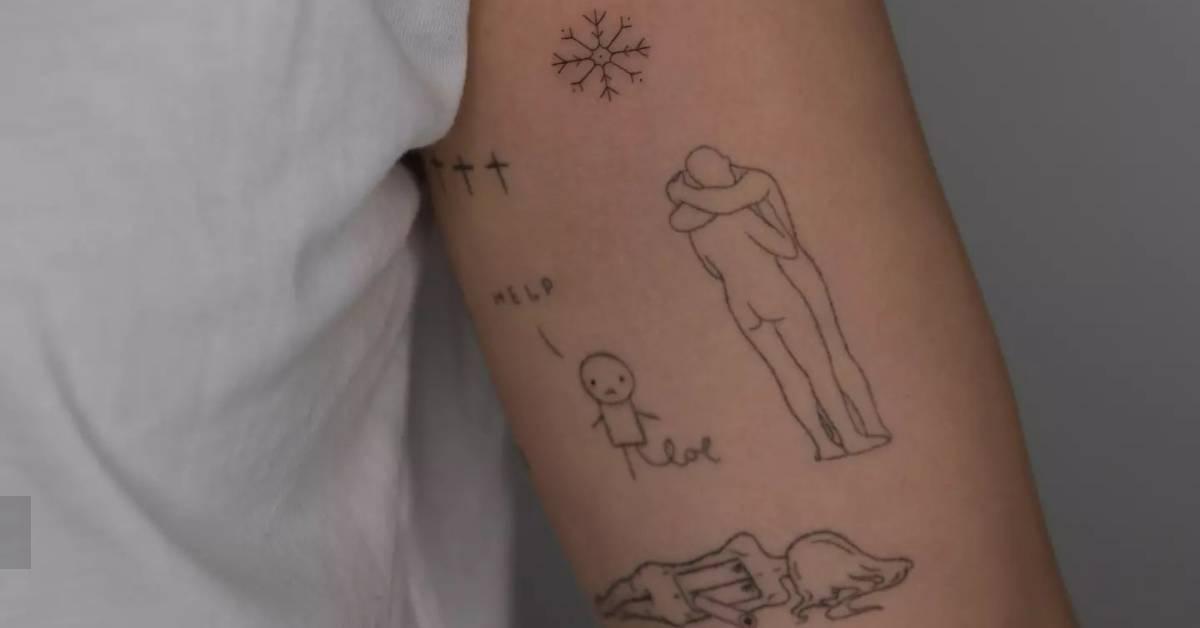 Fine line style arm composition tattoos.