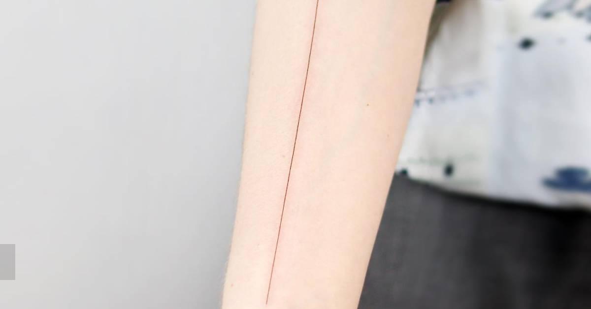 Minimalistic style line tattoo placed on the inner