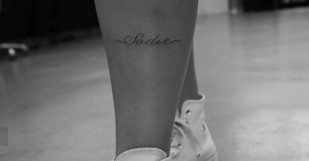 Lettering tattoo of the name "Sadie" located on the