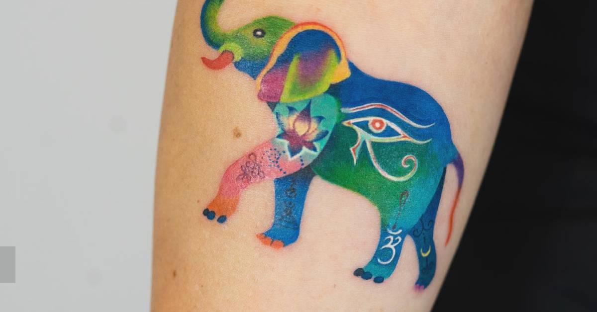 Colorful elephant tattoo located on the inner forearm.