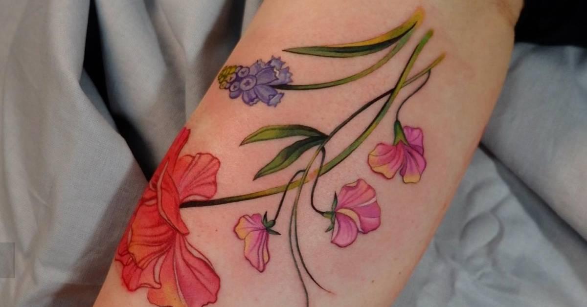 Illustrative style flower composition tattoo located on