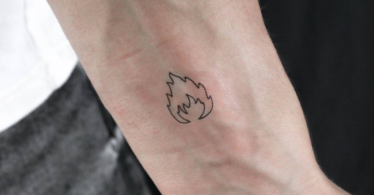 Small minimalistic fire flame temporary tattoo located