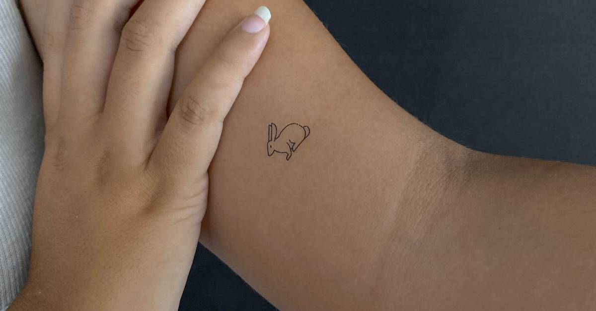 Fine line style little rabbit temporary tattoo done on