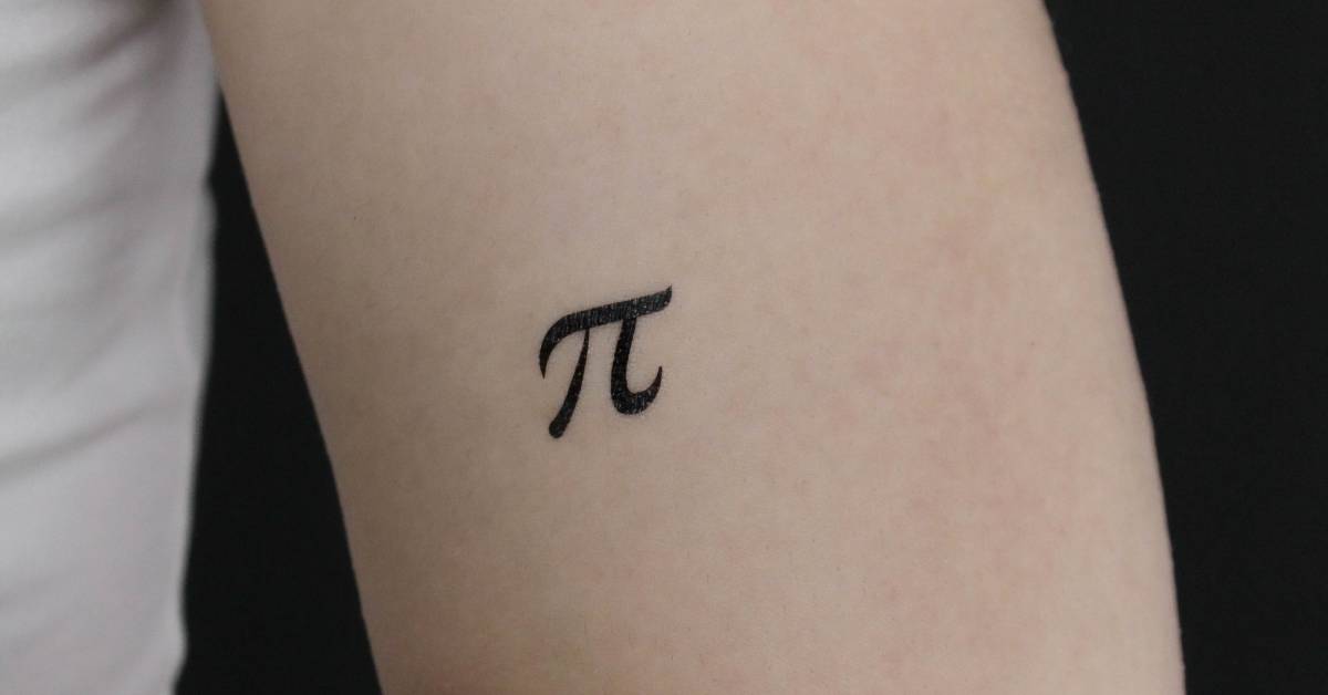 Minimalistic style letter Pi temporary tattoo located