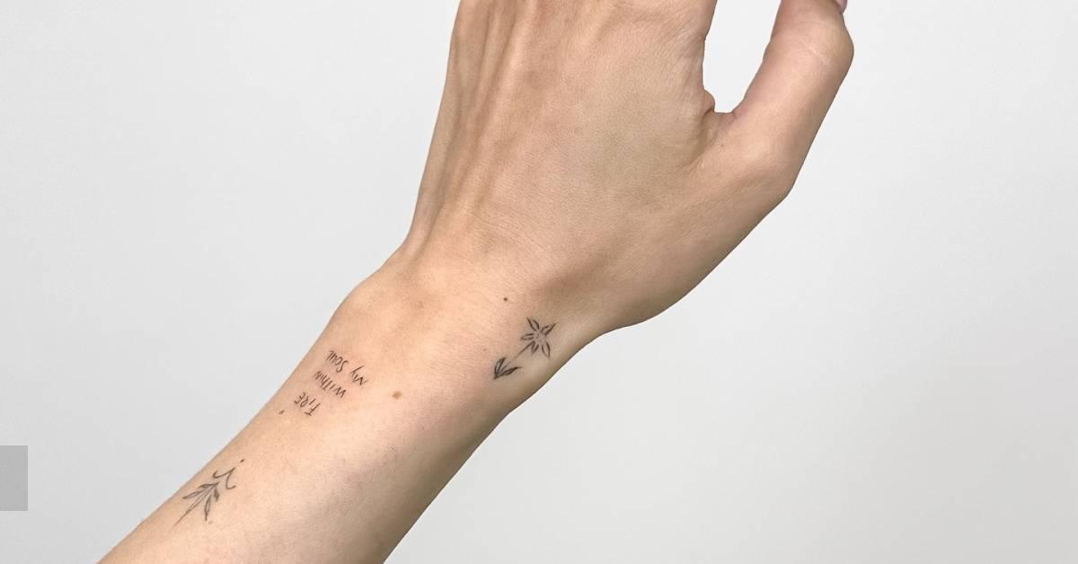 Fine line style forearm composition tattoos.