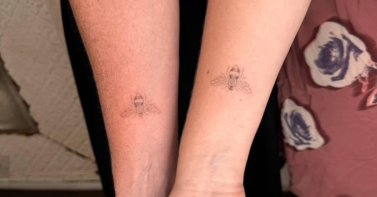 Matching single needle bee tattoo for best friends.