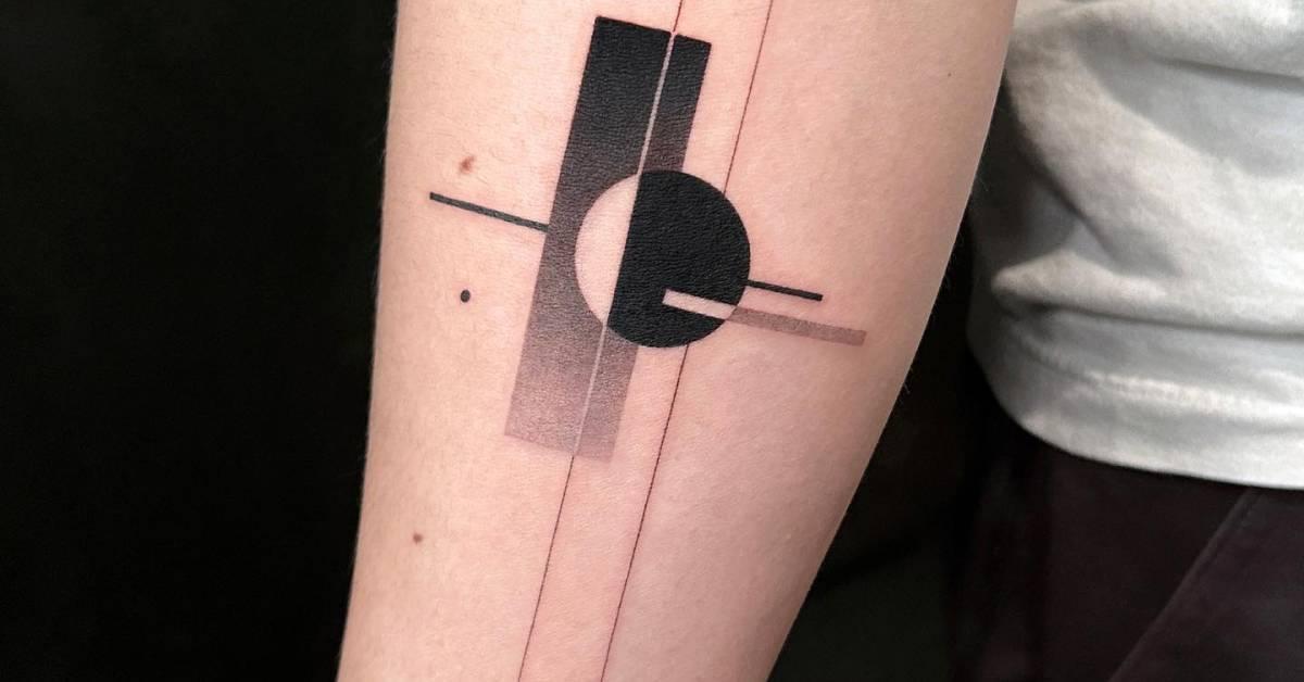 Abstract style geometric tattoo placed on the inner