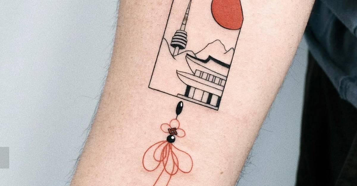 Illustrative style norigae tattoo located on the inner
