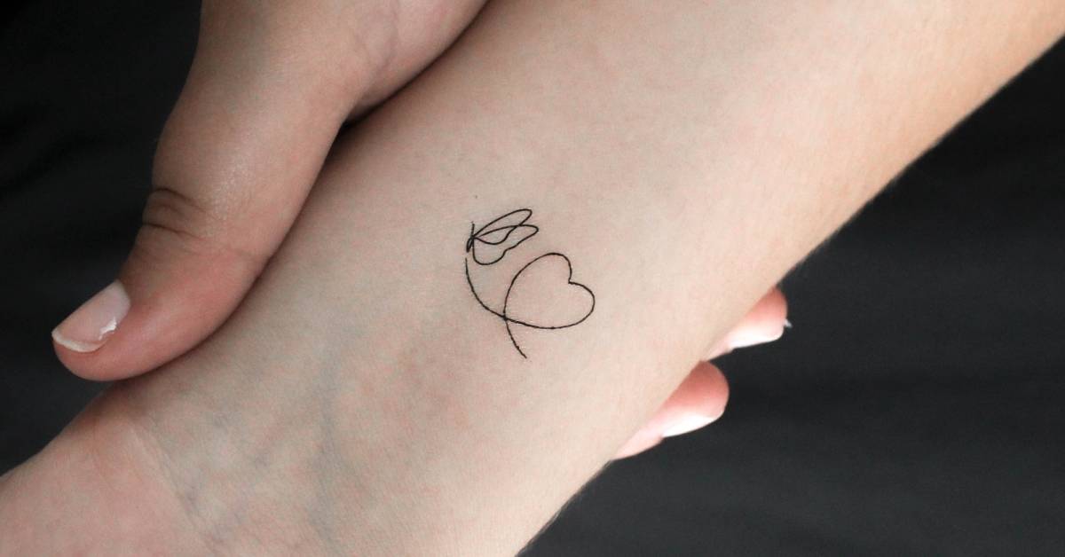 Fine line style butterfly and heart temporary tattoo