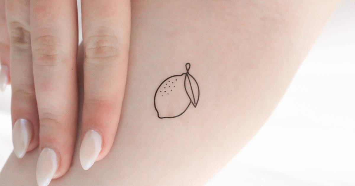 Minimalistic continuous line lemon temporary tattoo