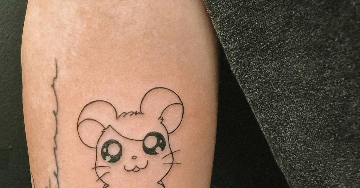 Hamtaro tattoo located on the inner forearm, cartoon