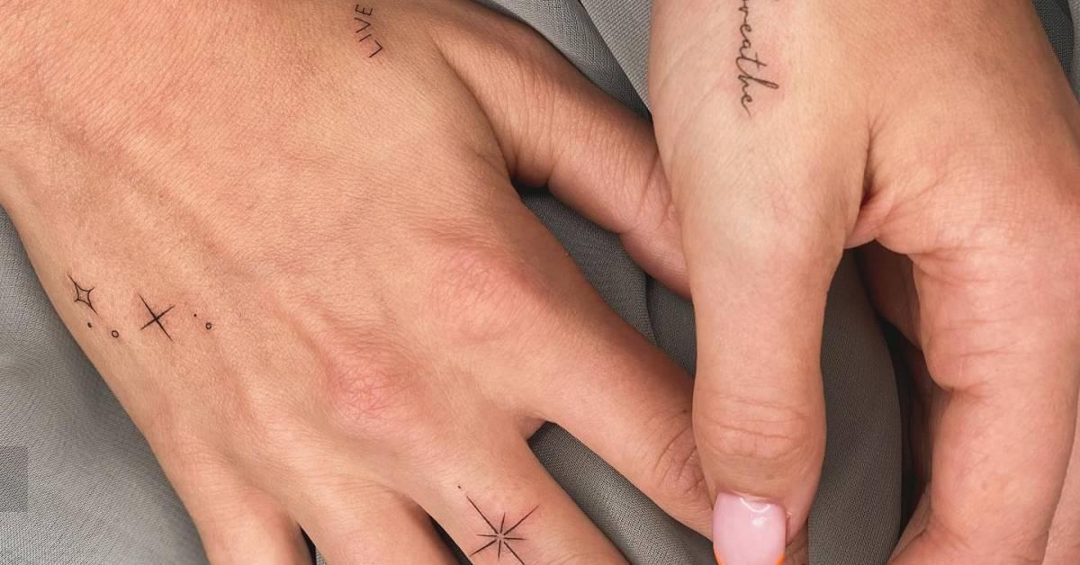 Fine line style hand composition tattoos.