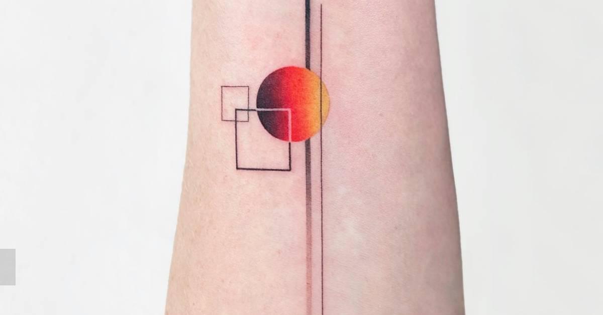 Abstract geometric tattoo located on the inner forearm.