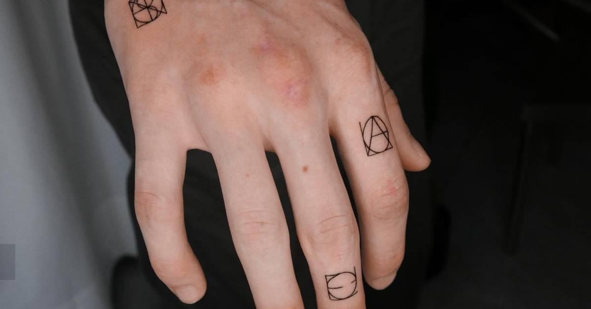 Minimalistic style hand composition tattoos.