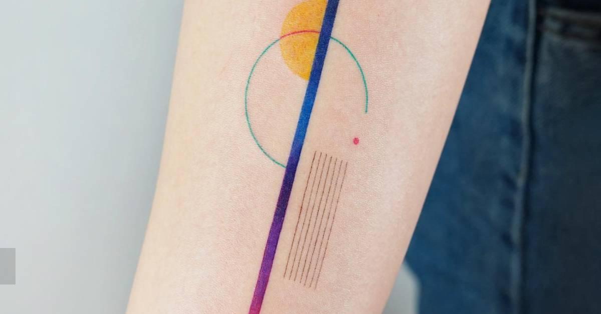 Abstract geometric tattoo located on the inner forearm.