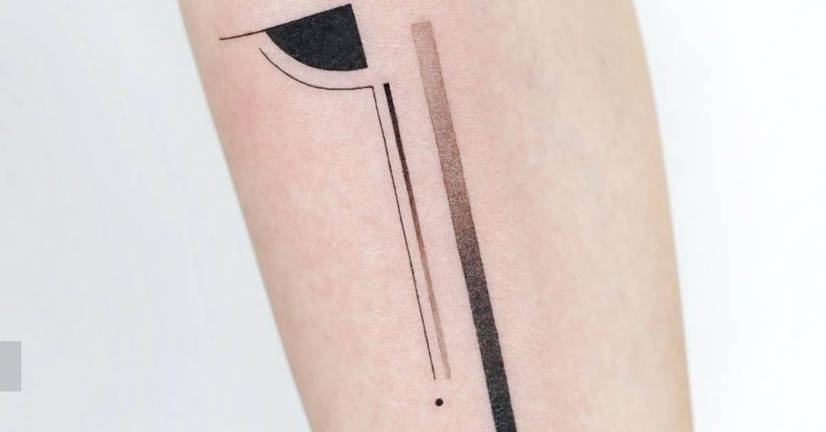 Abstract geometric tattoo located on the inner forearm.