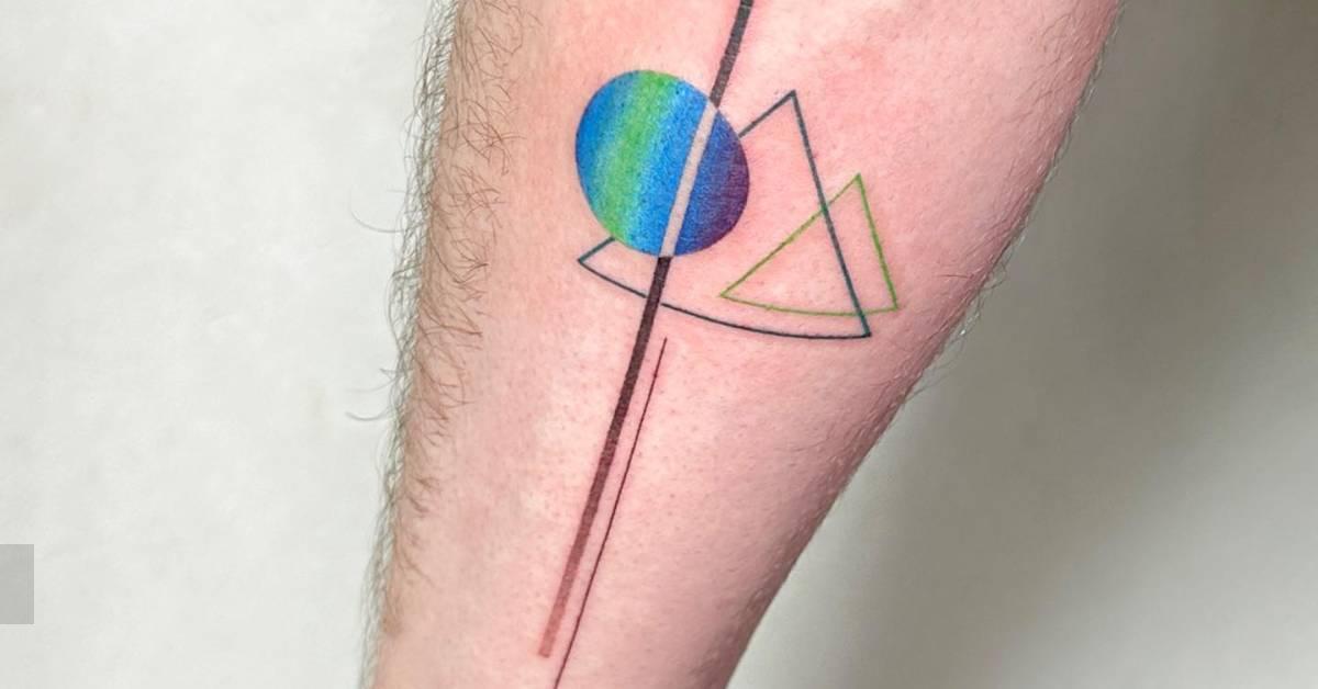 Abstract geometric tattoo located on the forearm.